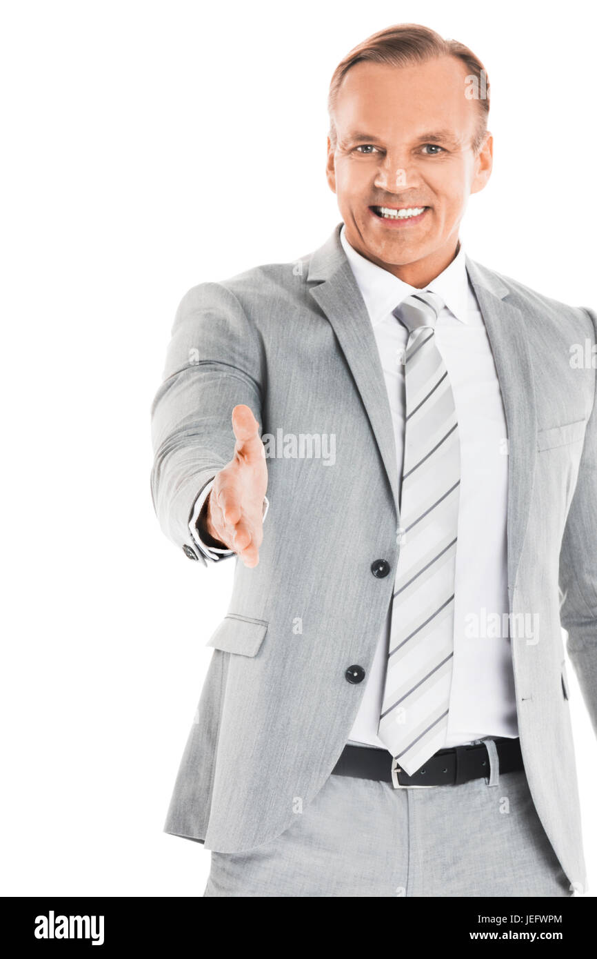Business man stretching out hand for shaking and smiling, isolated on ...