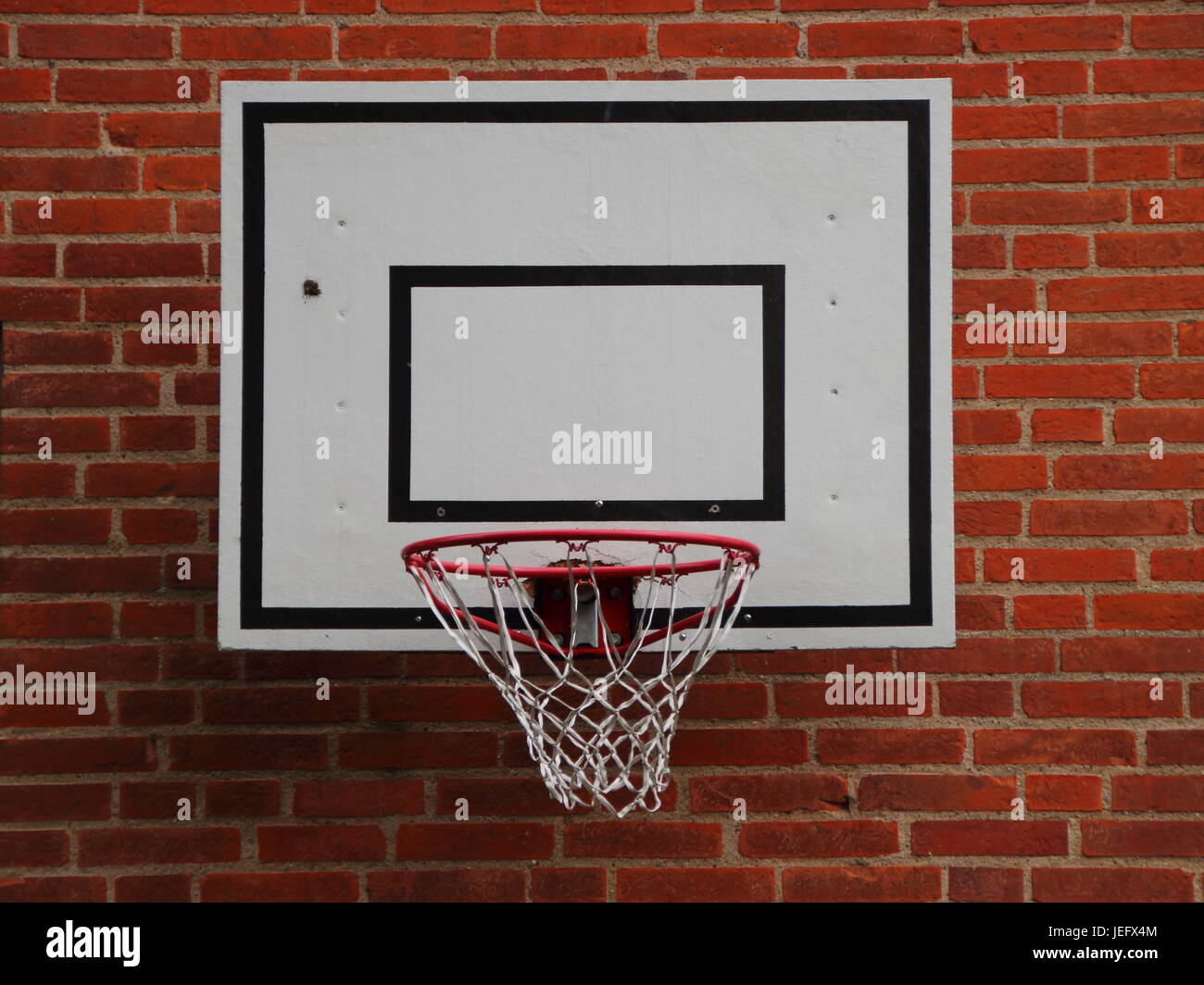 White Basketball Net Mounted on Red Brickwall background Stock Photo ...