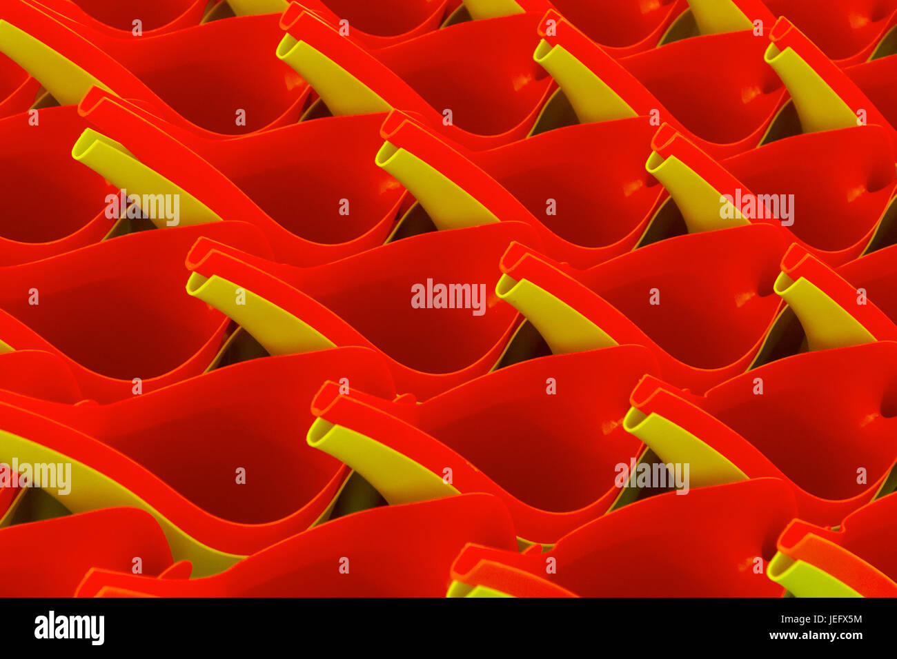 Stacked watering cans, selection of two bright colors Stock Photo - Alamy