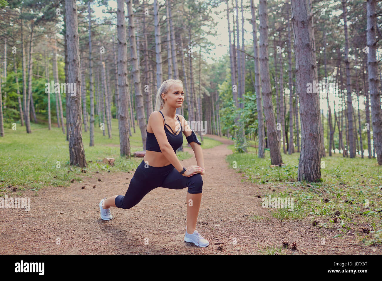 Woman runner warm up outdoor hi-res stock photography and images - Alamy