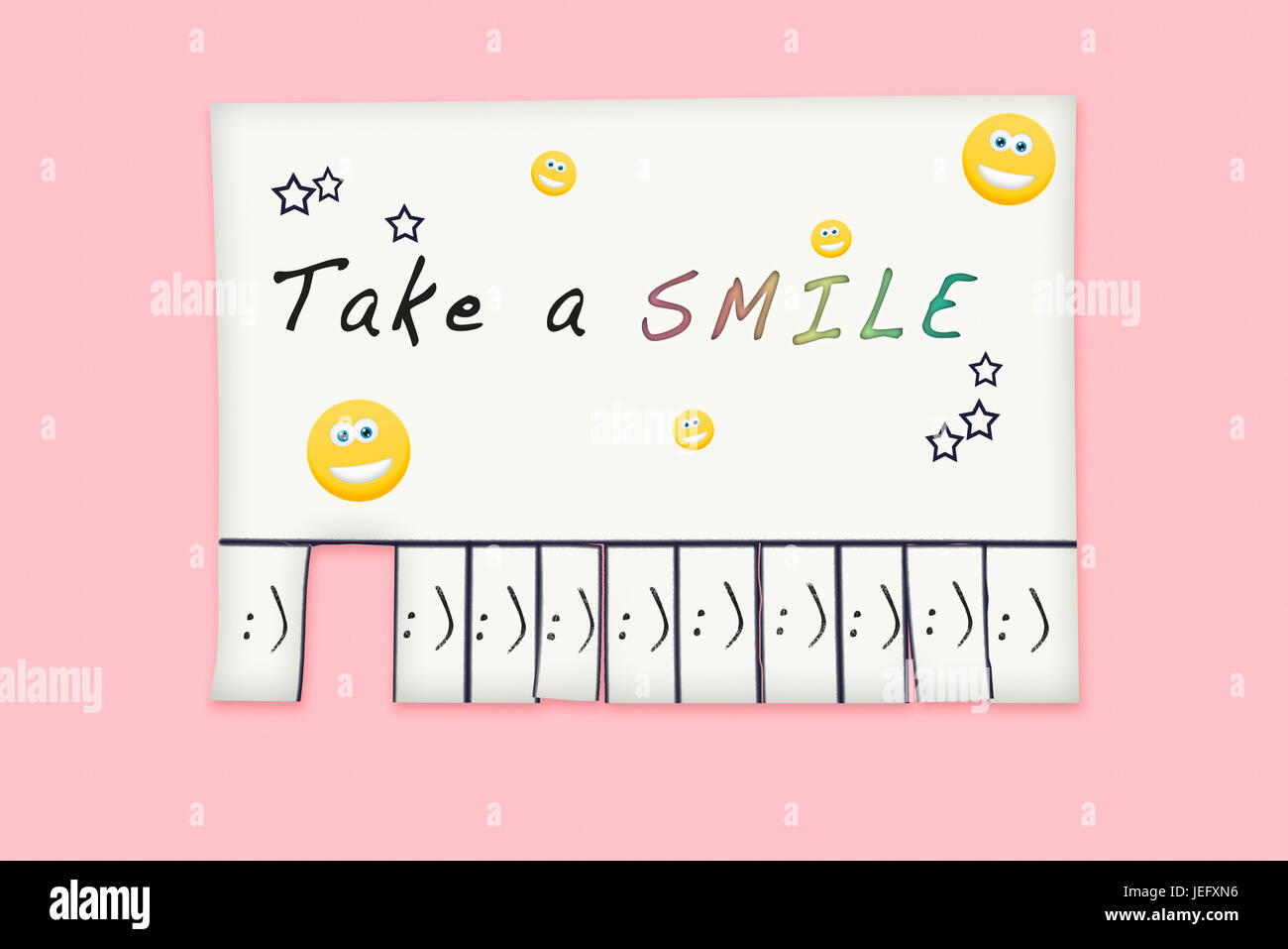 "Take a Smile" sign on a pink coloured wall with tear-off smiley faces ...