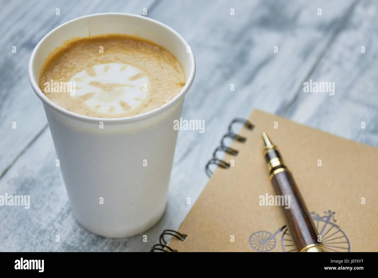 Coffee, notebook and pen Stock Photo - Alamy