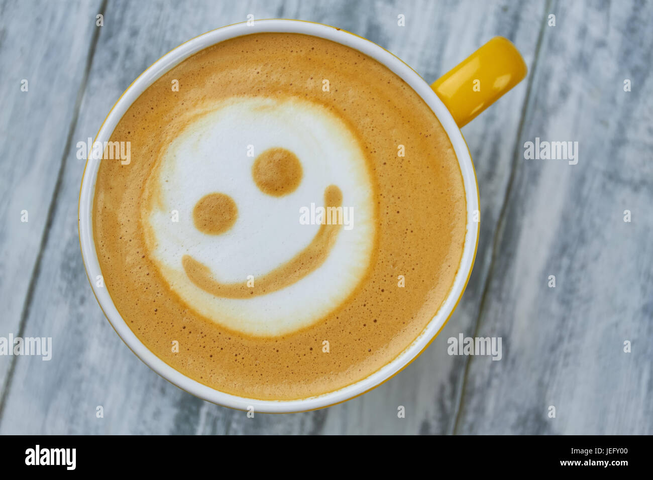 Latte art smiley face Stock Photo - Alamy