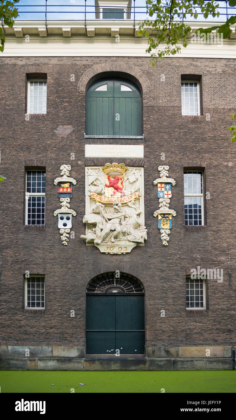 DELFT, NETHERLANDS - SEPTEMBER 18, 2016: Emblem on an old warehouse in ...