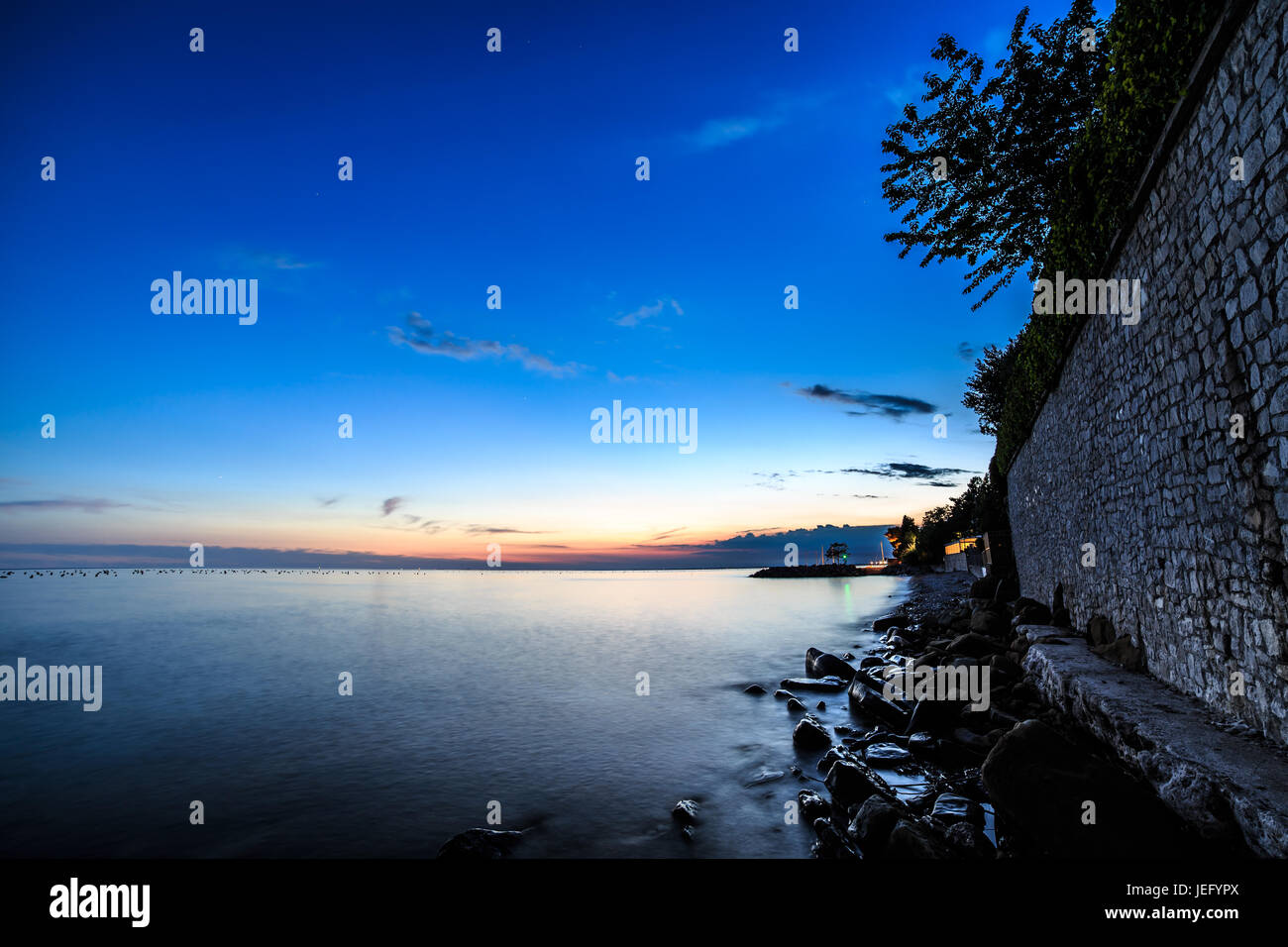 A spring sunset in the italian summer Stock Photo - Alamy