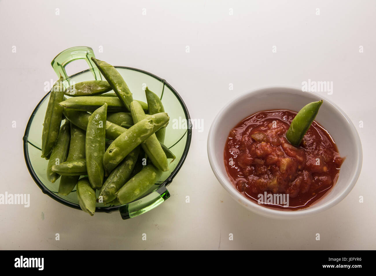 snap pea & salsa snack Stock Photo - Alamy