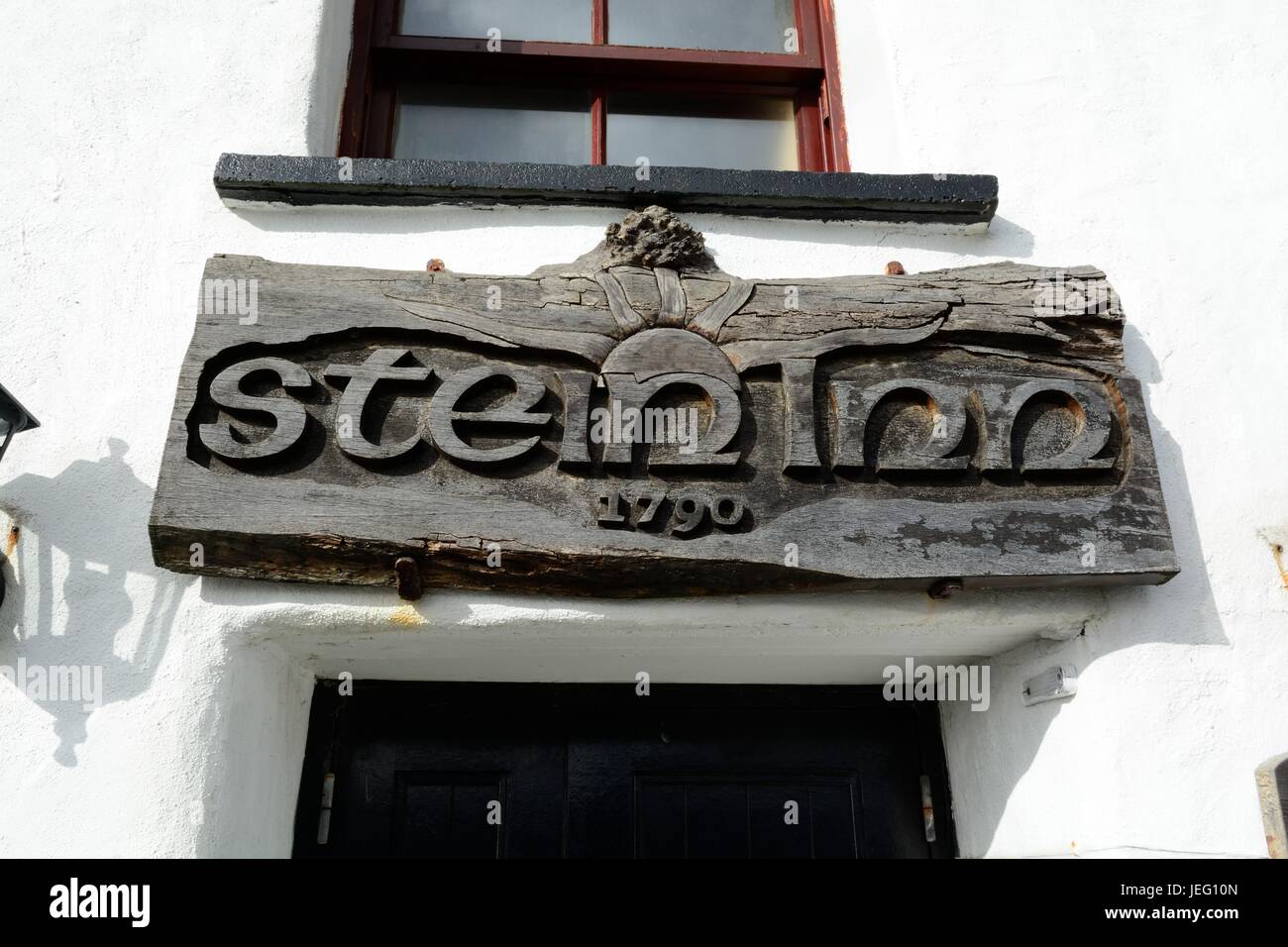 Carved wood wooden sign above the door of Stein Inn Oldest Inn on Isle ...