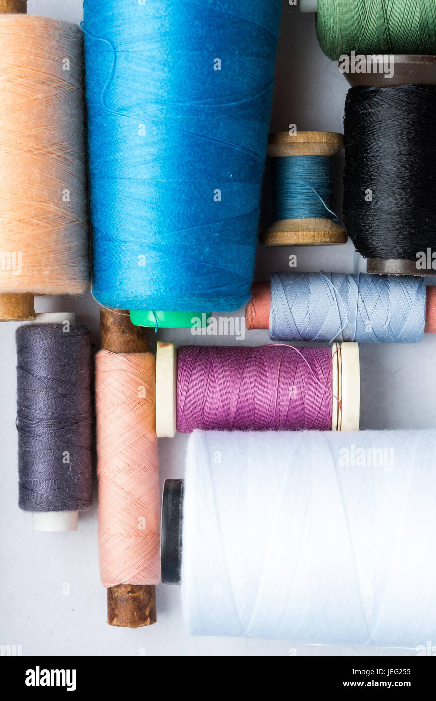 tailoring, sewing, patchwork and concept - closeup on blue, white ...