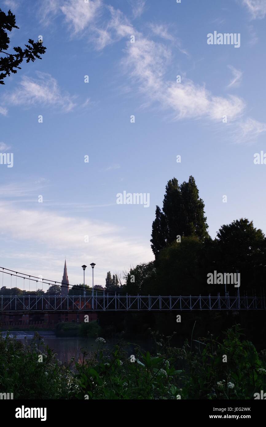 Trews Weir Suspension Bridge Over the River Exe and the Steeple of St ...