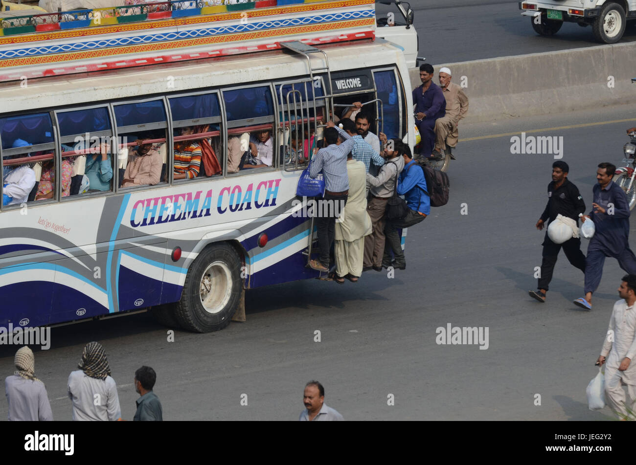 Lahore, Pakistan. 25th June, 2017. Pakistani people travel by ...