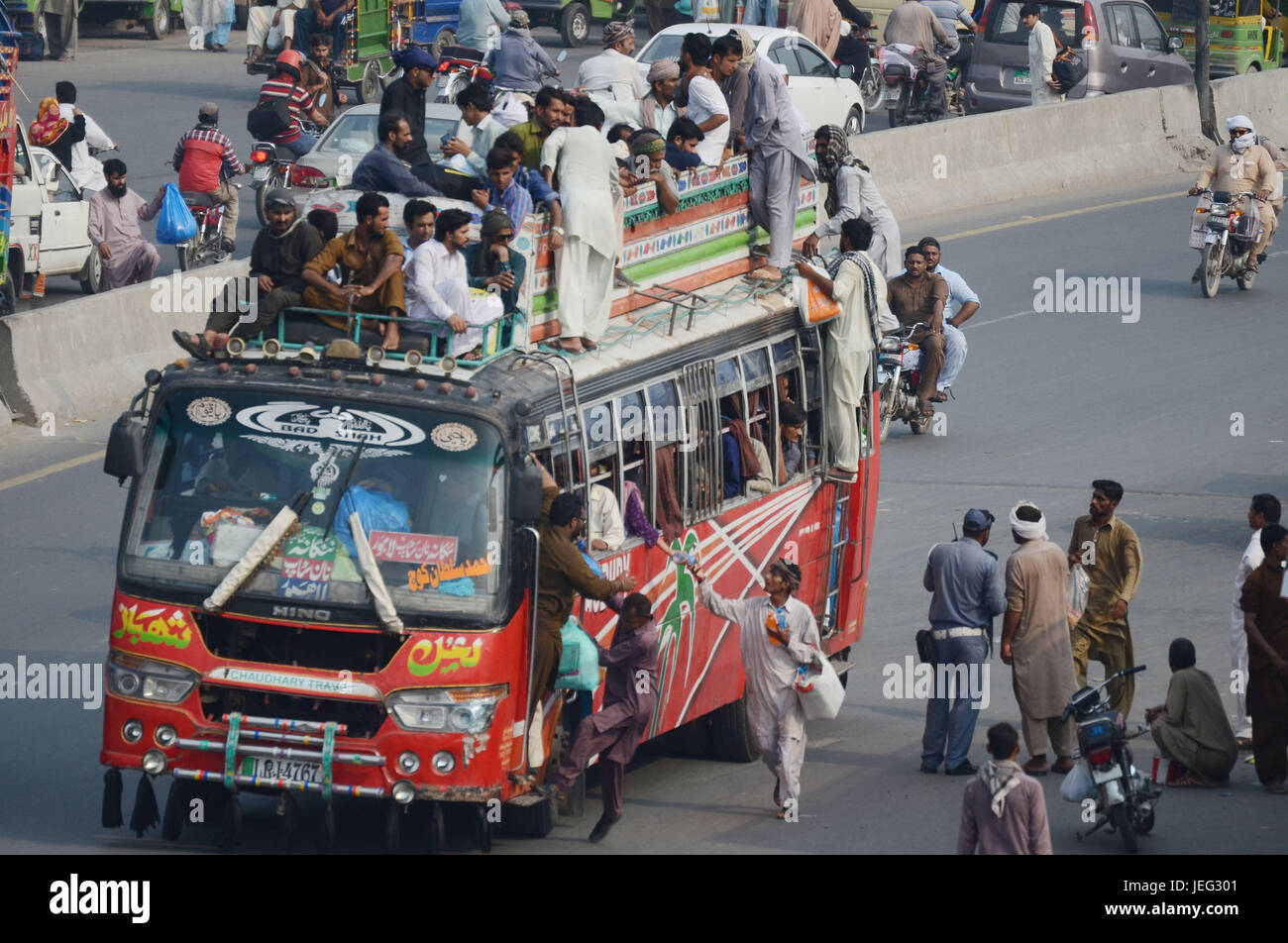 Lahore, Pakistan. 25th June, 2017. Pakistani people travel by ...