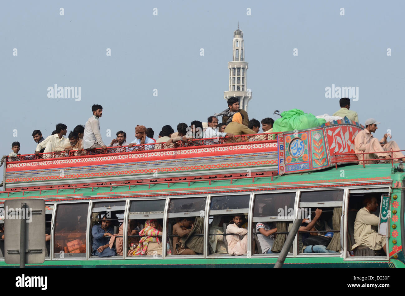Lahore, Pakistan. 25th June, 2017. Pakistani people travel by ...