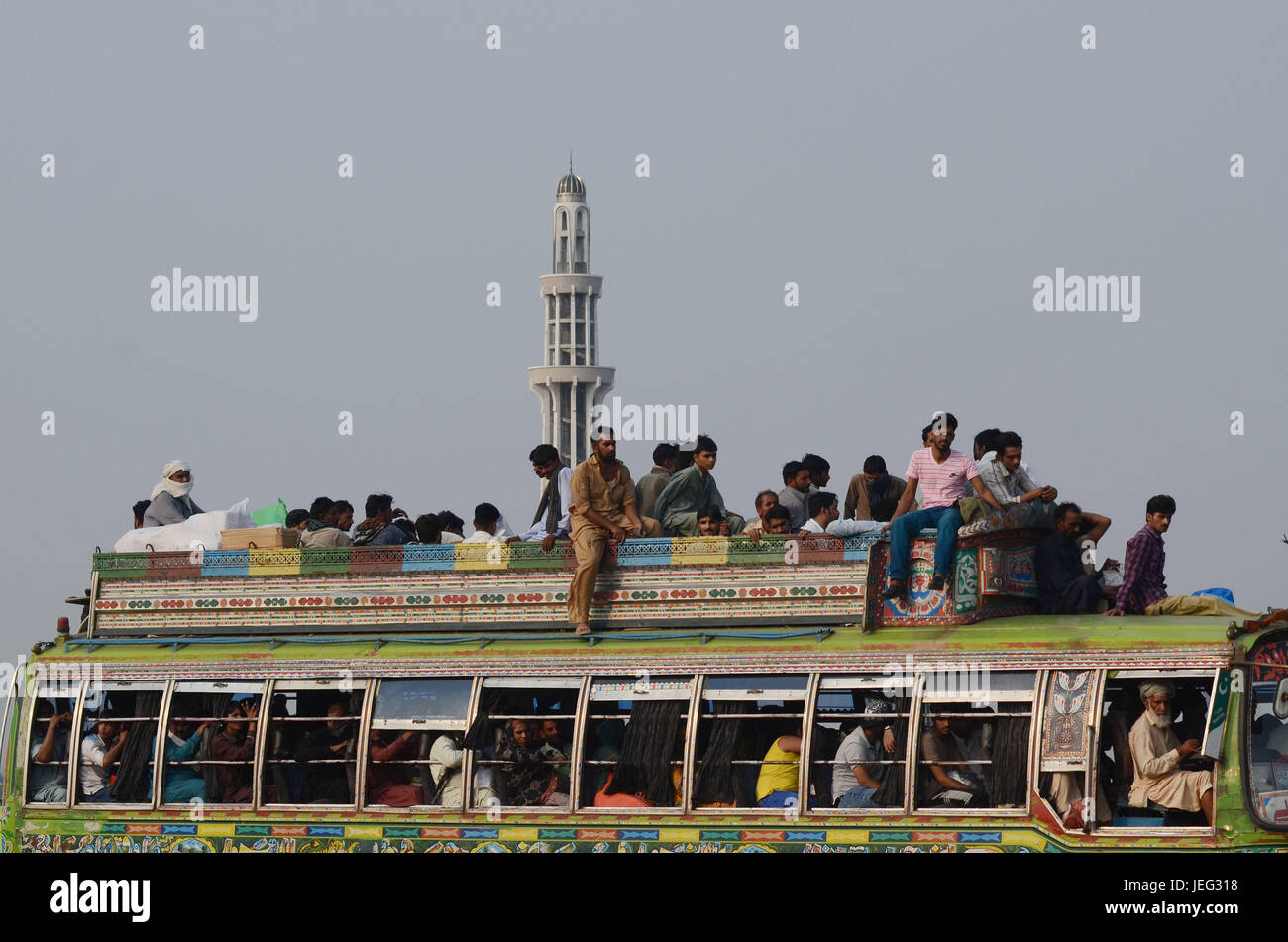 Lahore, Pakistan. 25th June, 2017. Pakistani people travel by ...