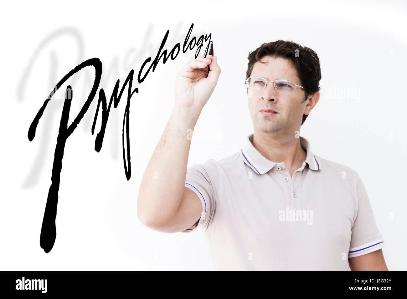 Man is writing "Psychology Stock Photo - Alamy