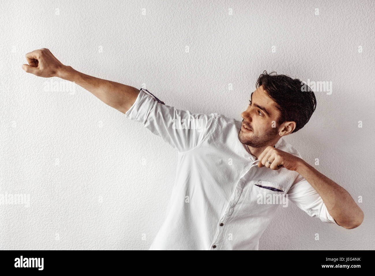 Young handsome casual guy posing hi-res stock photography and images ...