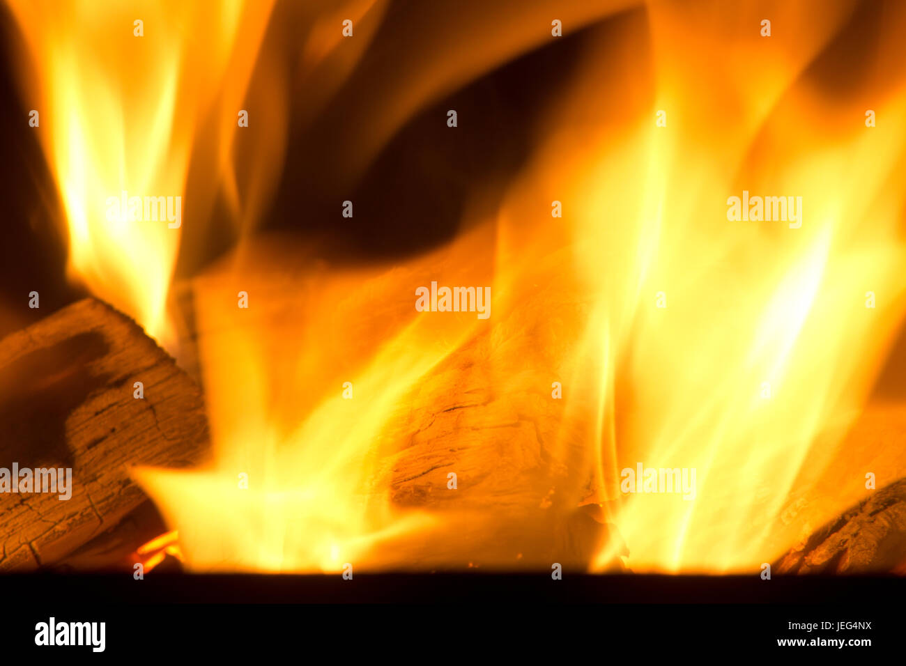 Image of burning logs hi-res stock photography and images - Alamy
