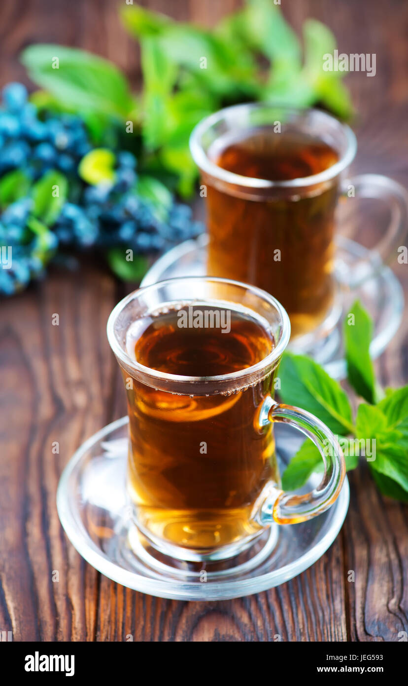 blueberry tea in cup and on a table Stock Photo - Alamy