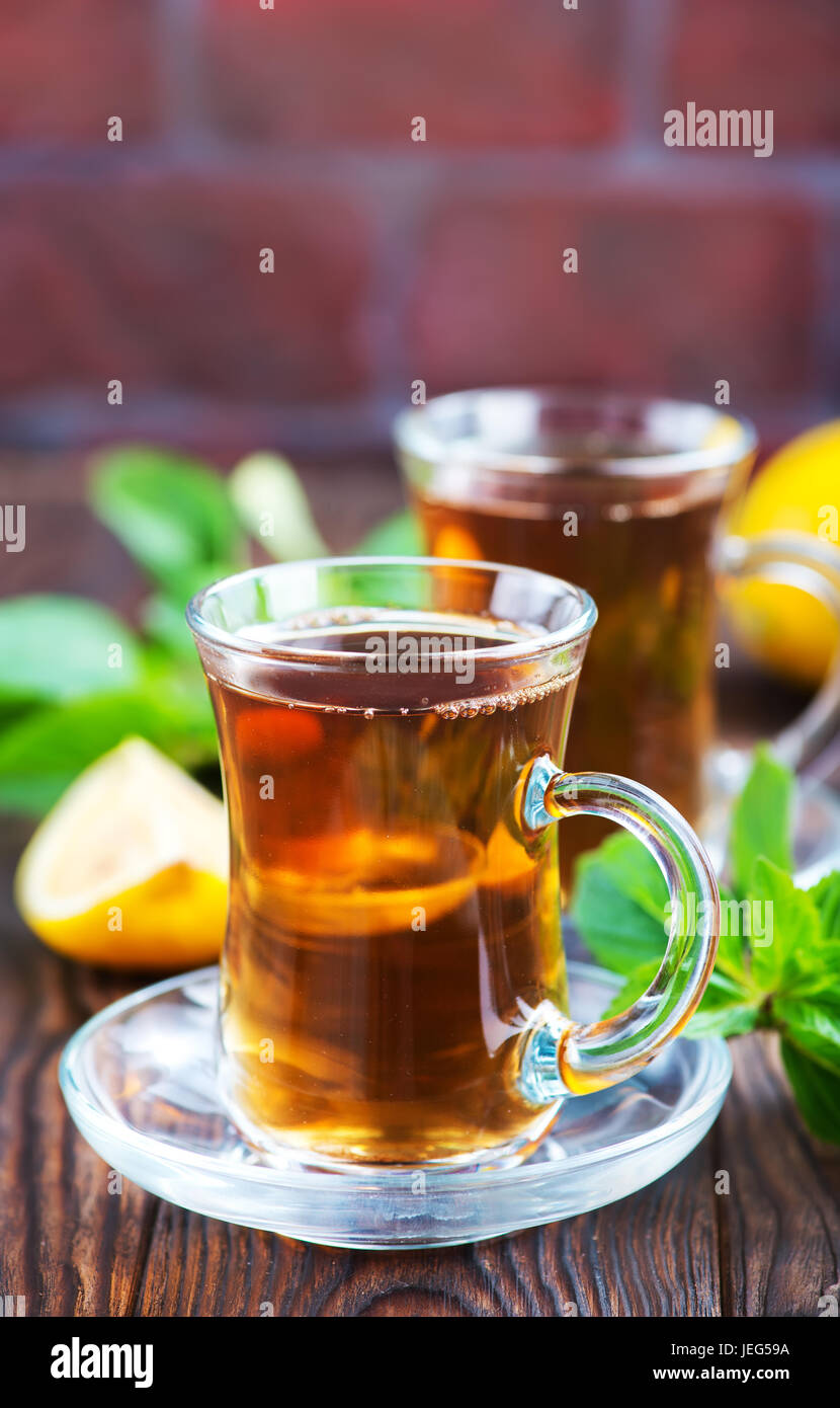 lemon tea in cup and on a table Stock Photo - Alamy