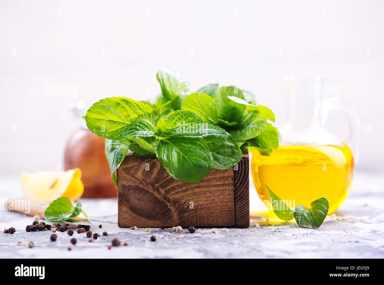 fresh mint in box and on a table Stock Photo - Alamy