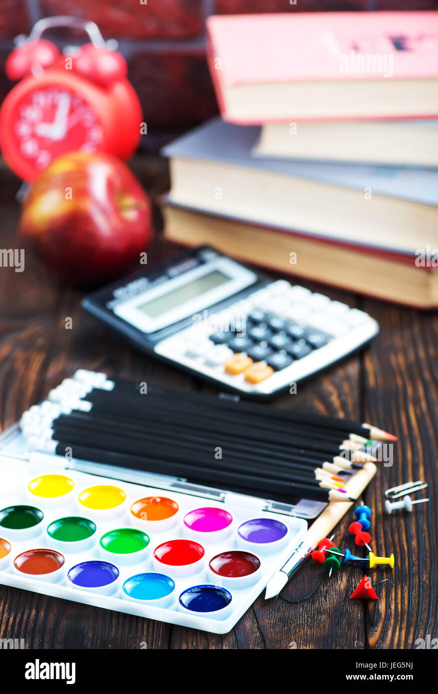 color paint and brushes on a table Stock Photo - Alamy