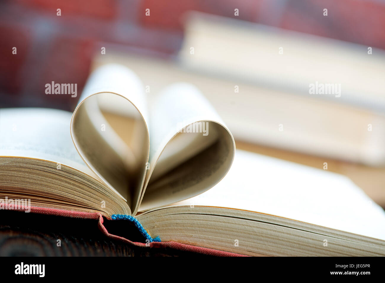 books on a table, old book, stock photo Stock Photo - Alamy