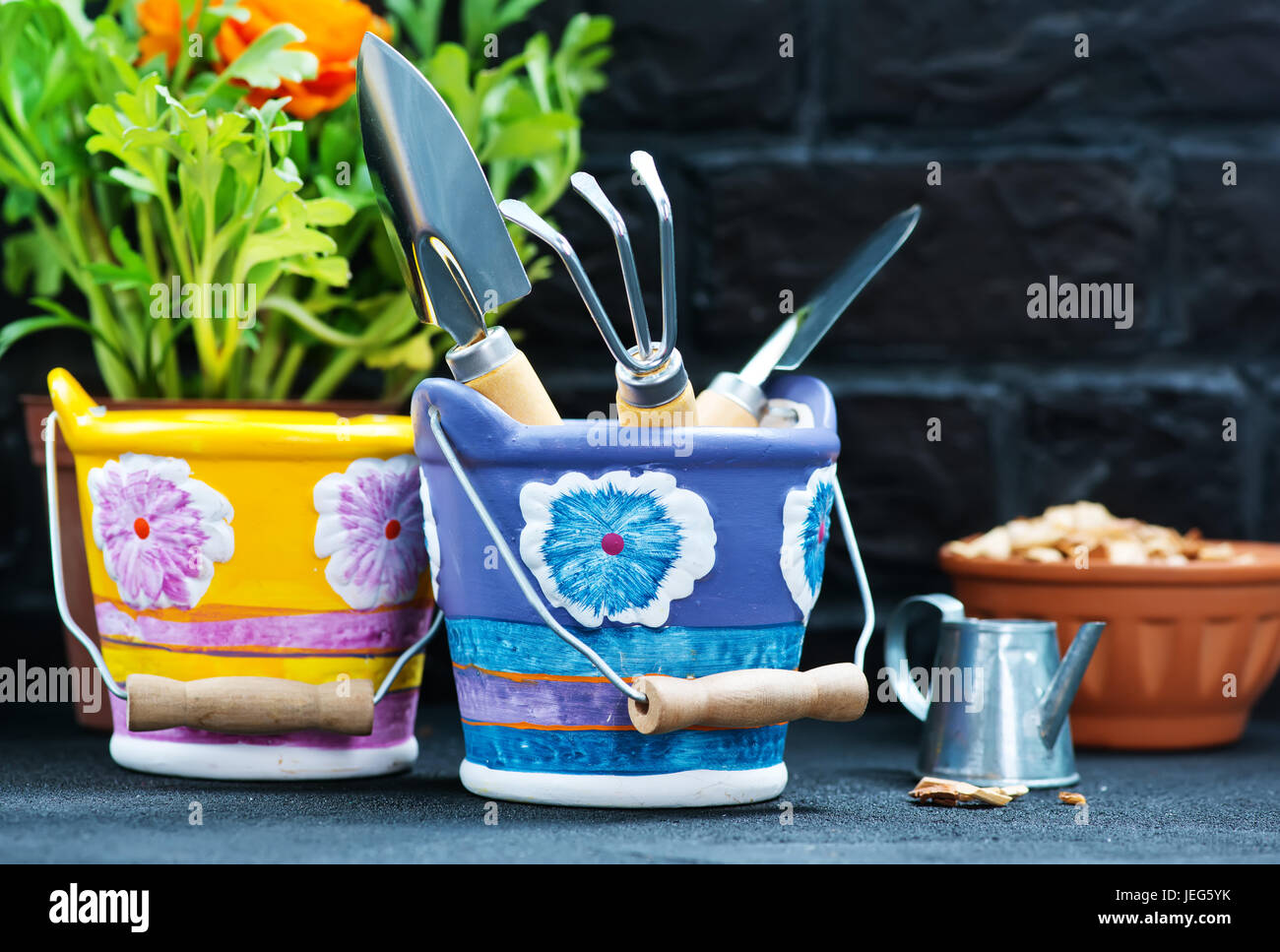 garden supplies on the black table, stock photo Stock Photo - Alamy