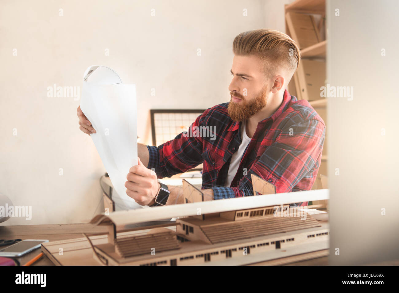 Architect looking maquette construction layout hi-res stock photography ...