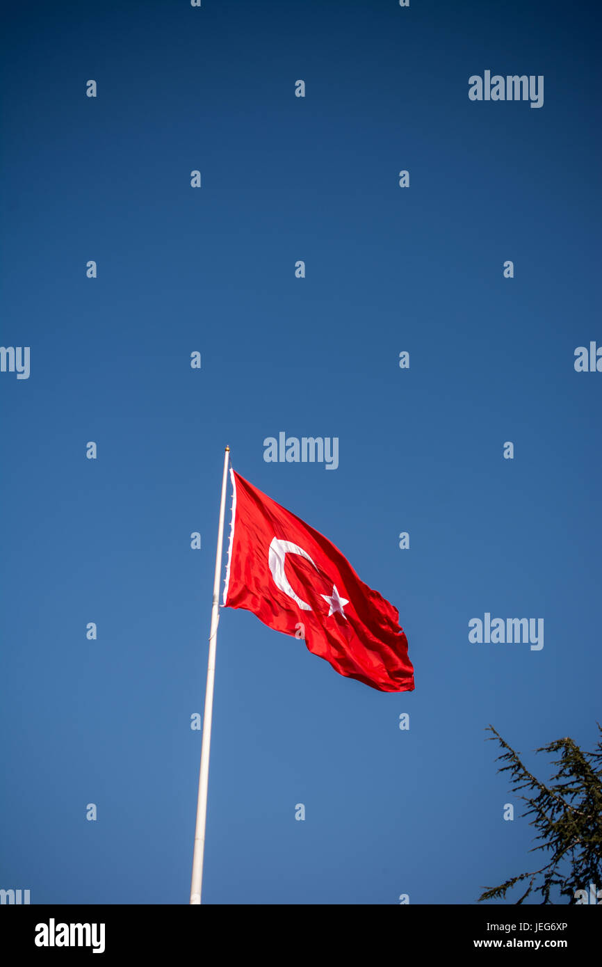 Turkish national flag hang on a pole in open air Stock Photo - Alamy