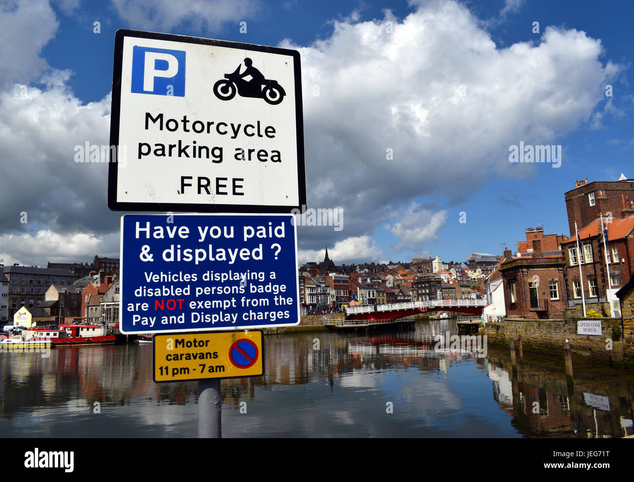 Mixed car parking signs - Whitby Yorkshire Stock Photo - Alamy
