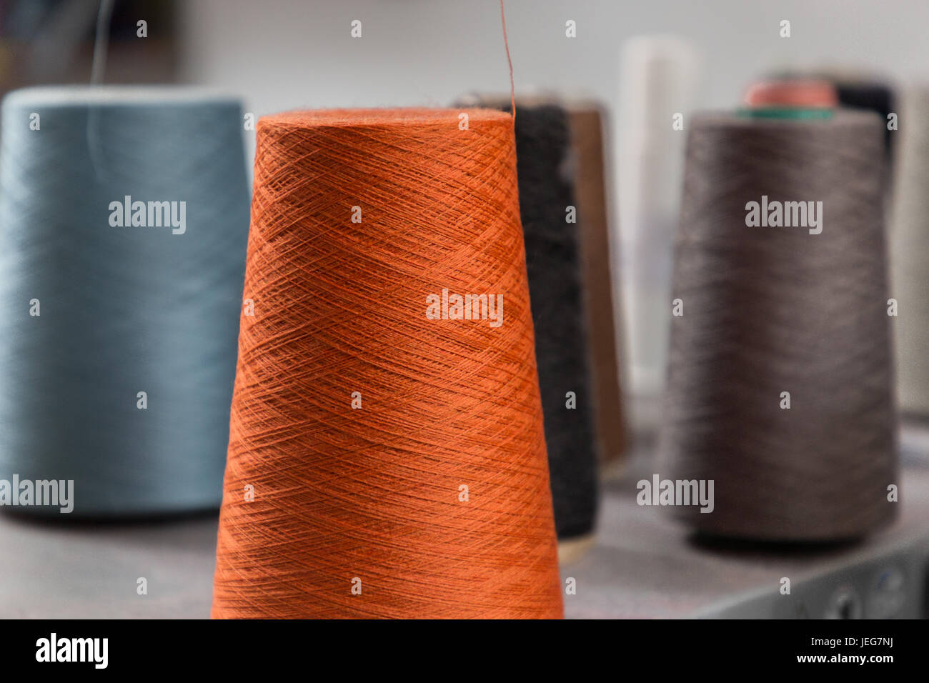 cones of thread for weaving Stock Photo - Alamy