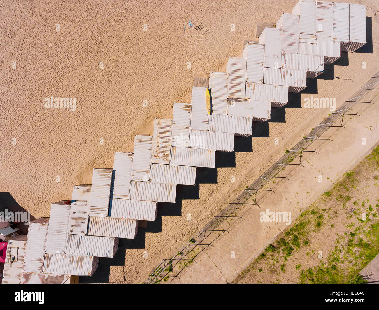 Top view aerial photo of freight containers in rows on beach. Cargo ...