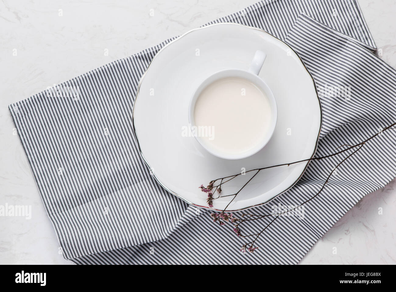 Dairy products. Top view of a cup of milk on a table Stock Photo - Alamy