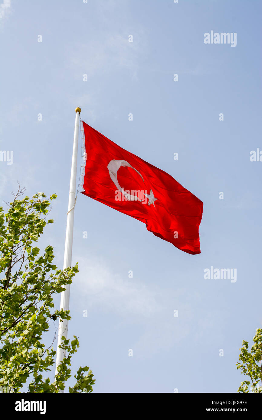 Turkish national flag hang on a pole in open air Stock Photo - Alamy