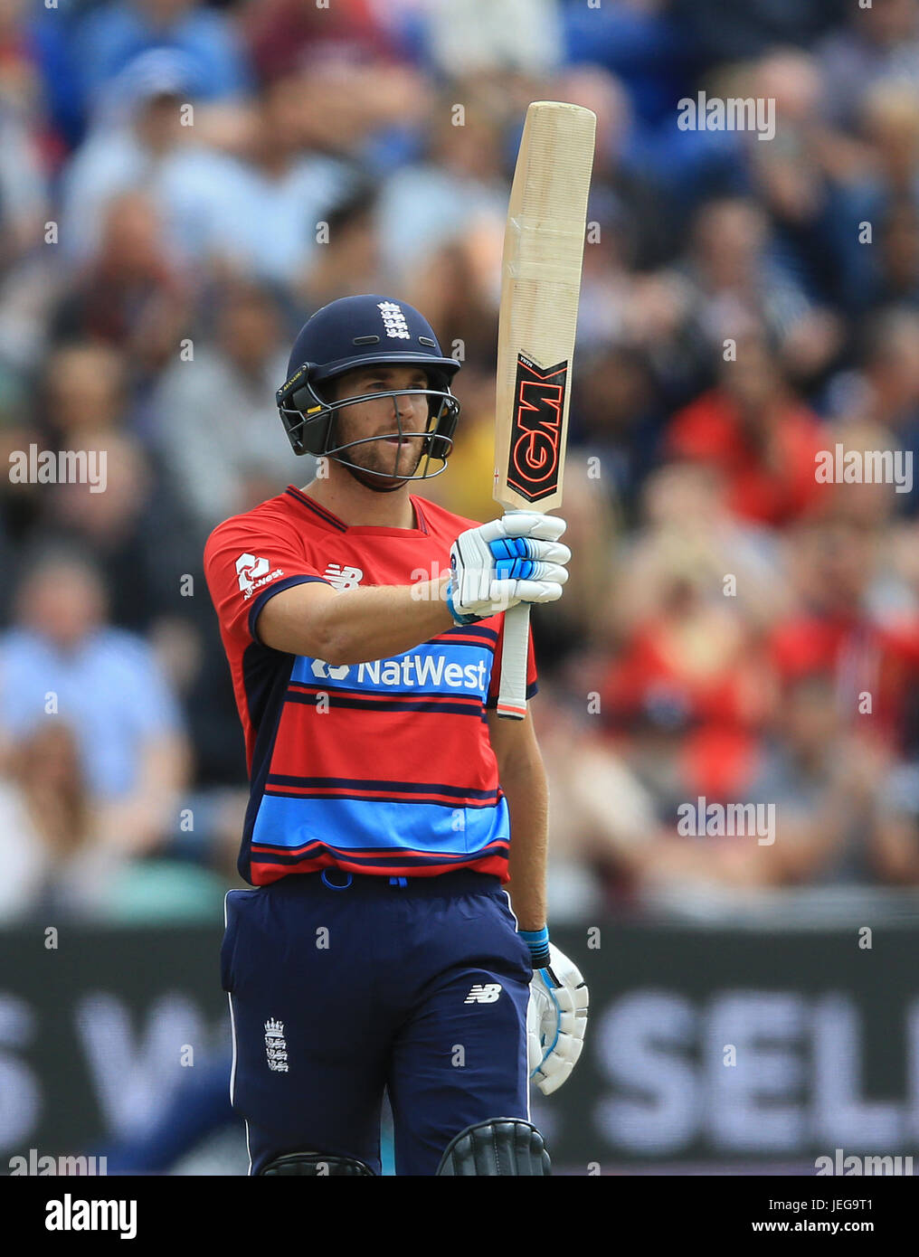England's Dawid Malan raises his bat after reaching his half century ...