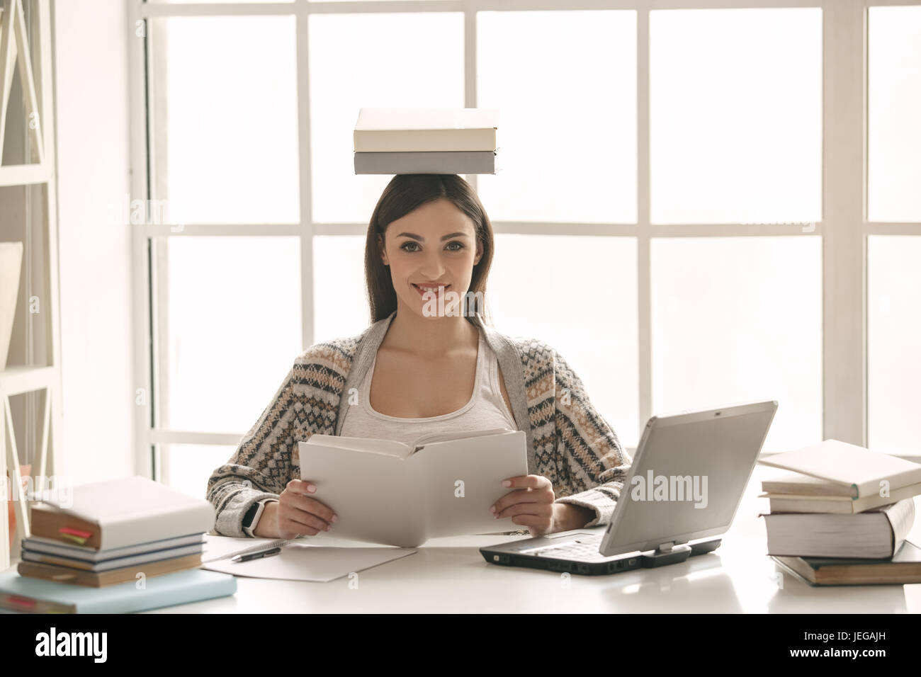 Young woman study at home alone meditation Stock Photo - Alamy