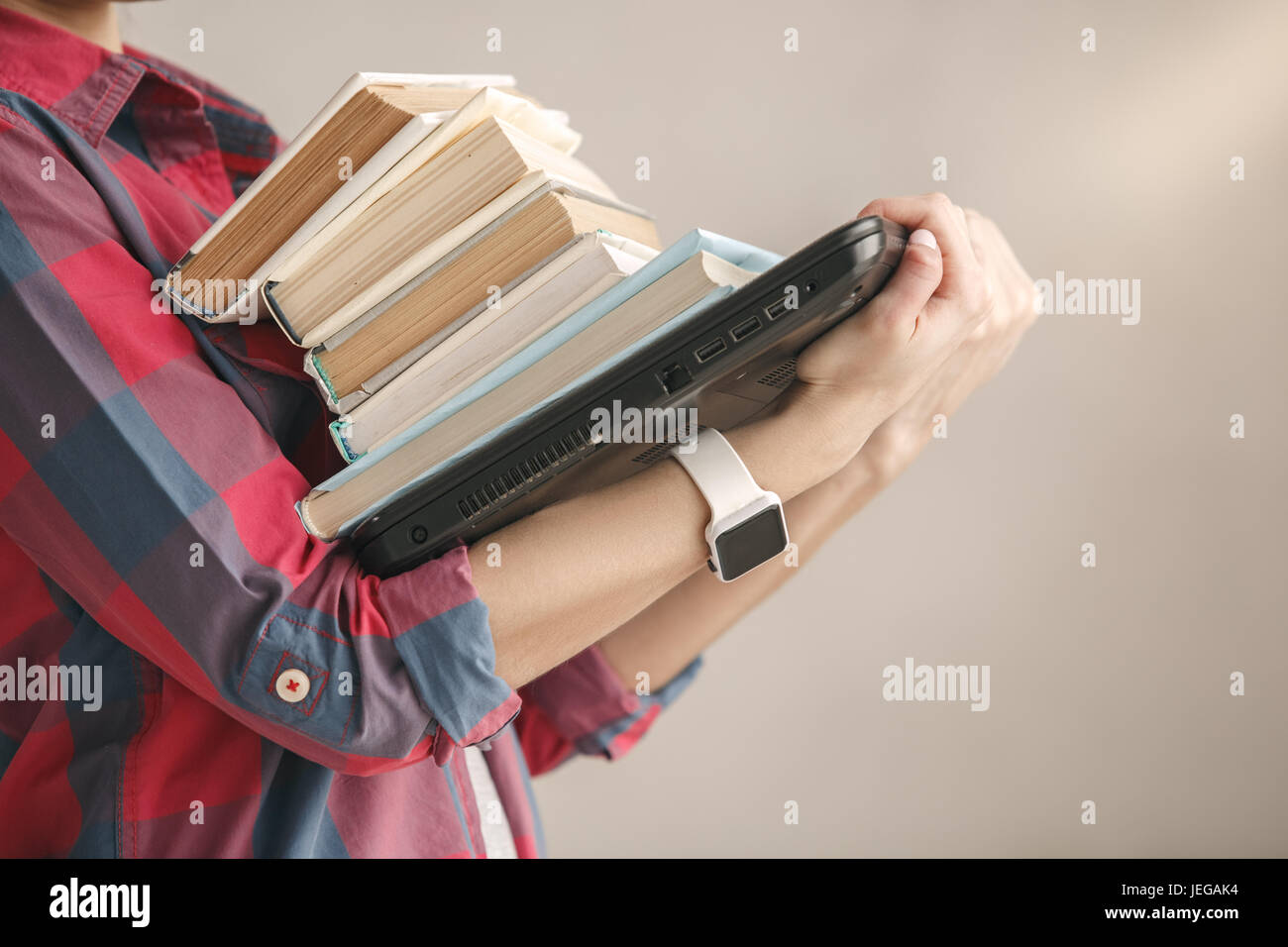 Young female carry books isolated on white Stock Photo - Alamy