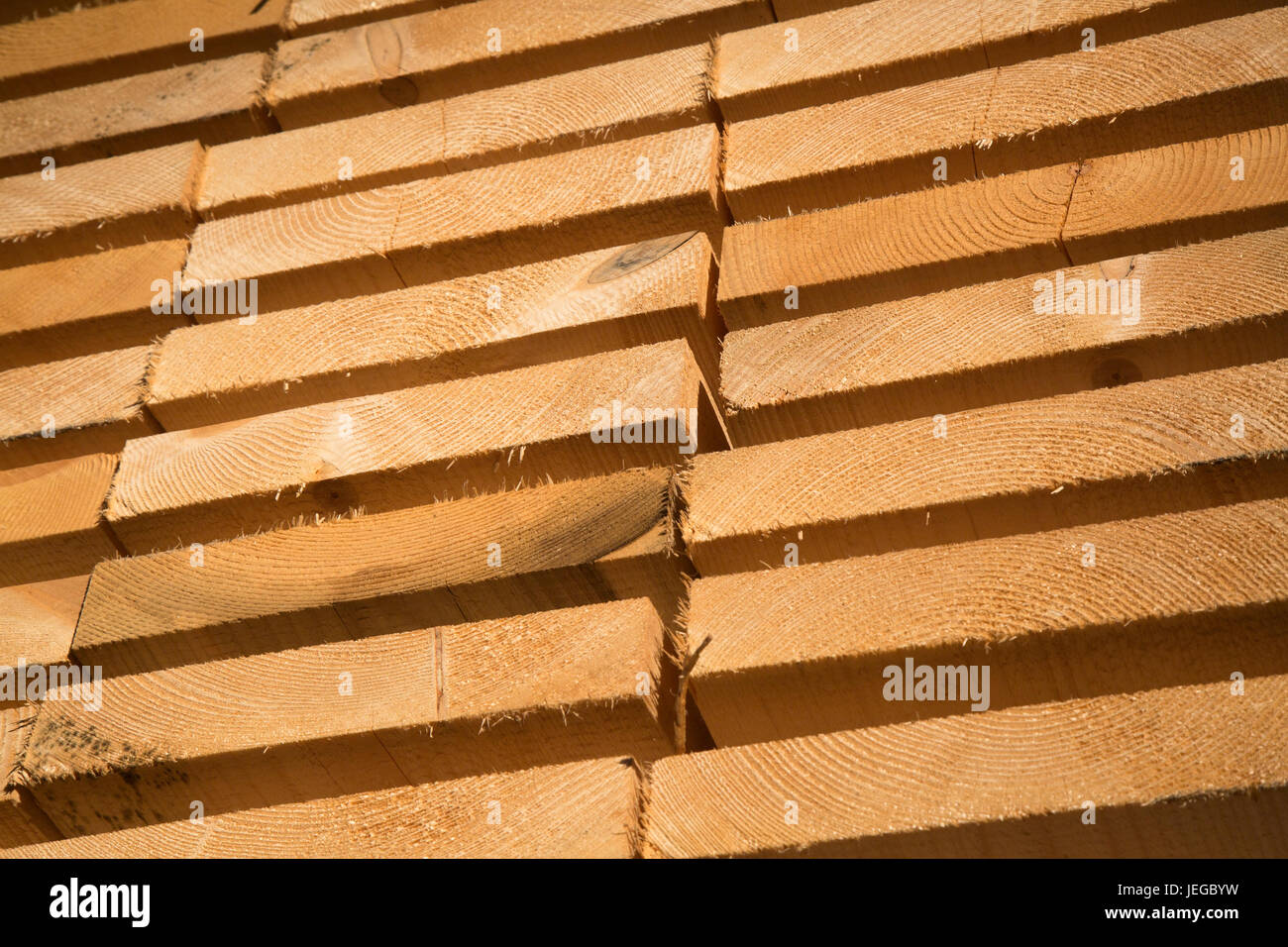 Stack of new wooden studs at the lumber yard Stock Photo - Alamy
