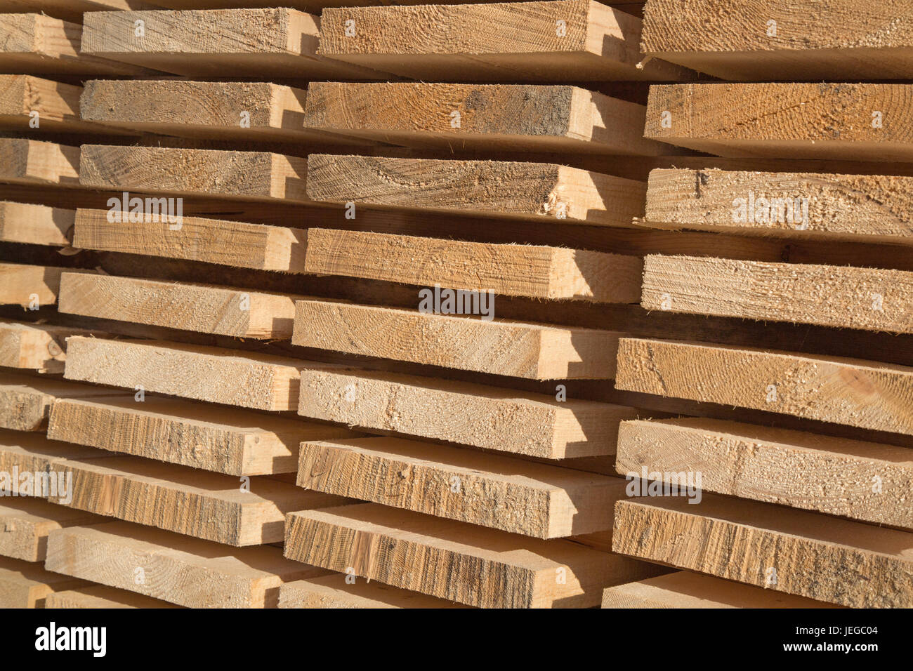 Stack of new wooden studs at the lumber yard Stock Photo - Alamy