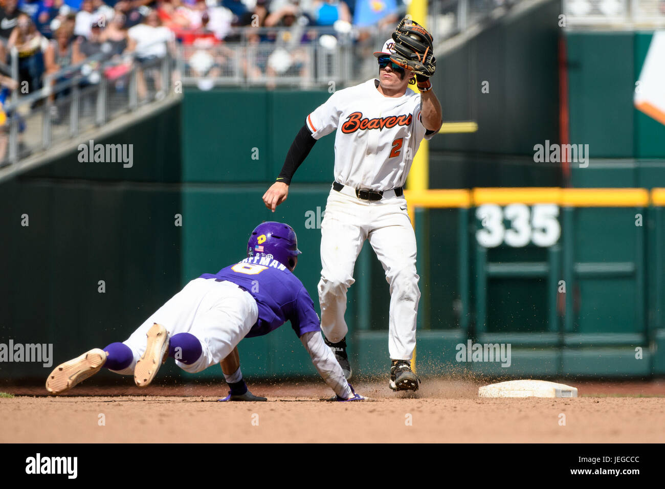 Omaha, NE USA. 23rd June, 2017. LSU's Cole Freeman #8 dives into second ...