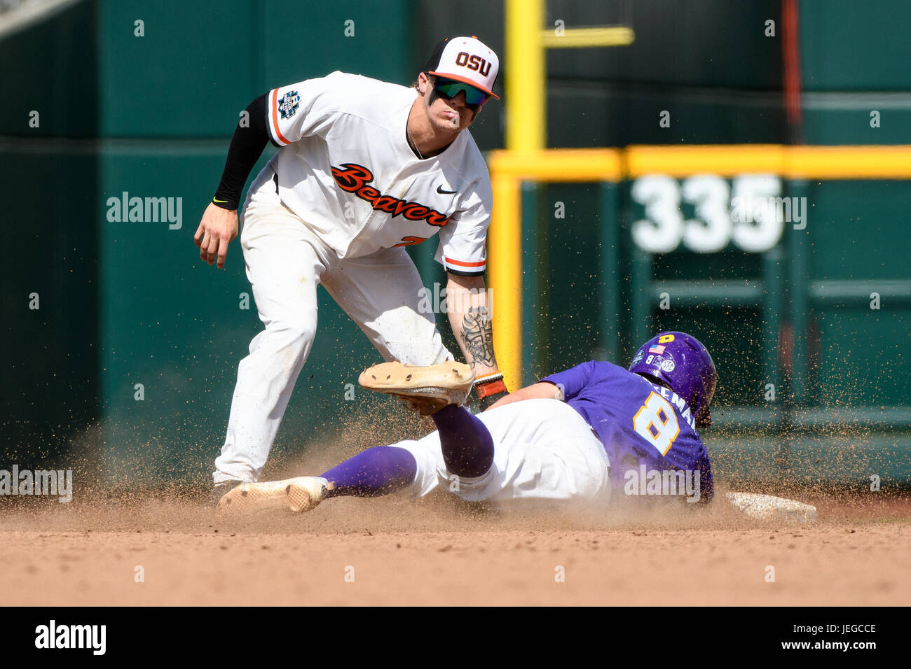 Omaha, NE USA. 23rd June, 2017. LSU's Cole Freeman #8 dives into second ...