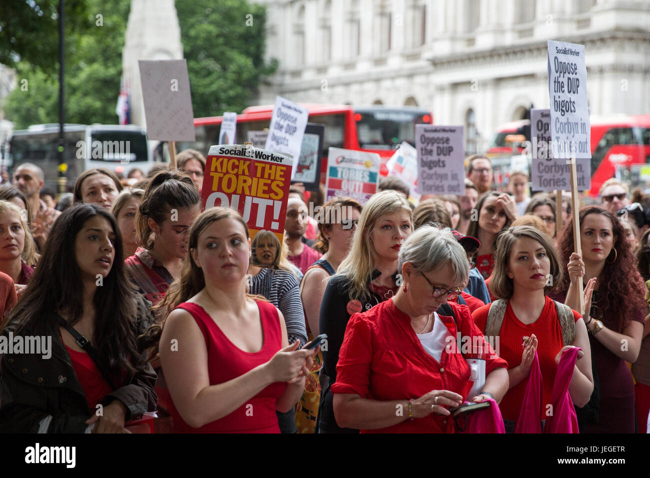 London, UK. 24th June, 2017. Women, many of whom wearing red, protest ...