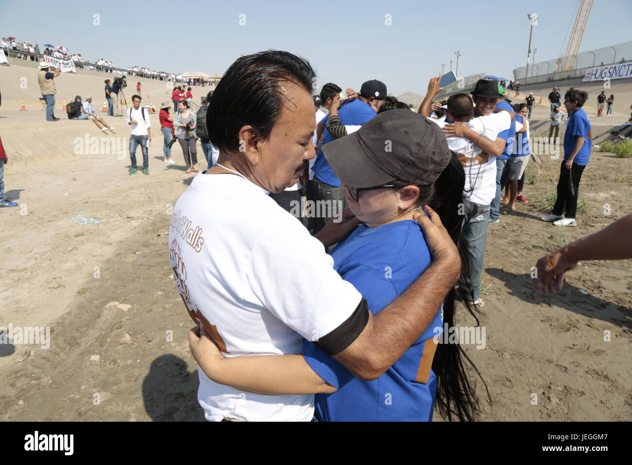 Juarez, Mexico. 24th June, 2017. Members of a family hug each other ...