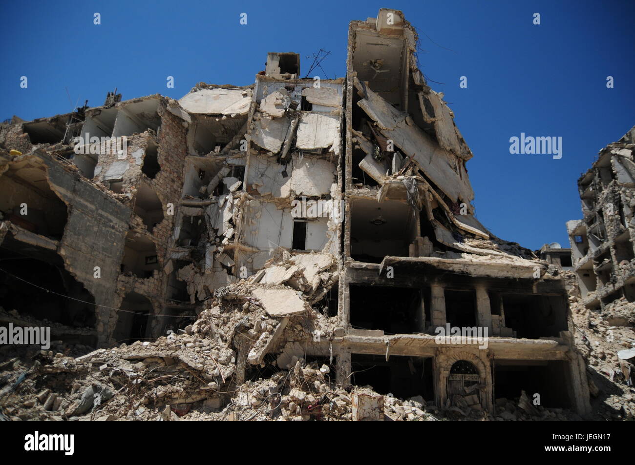 Picture of many buildings around the citadel of Aleppo, Syria partially ...
