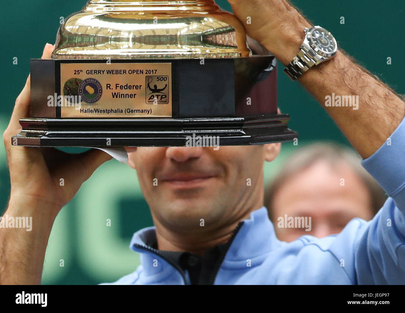 Halle, Germany. 25th June, 2017. Switzerland's Roger Federer holds the ...