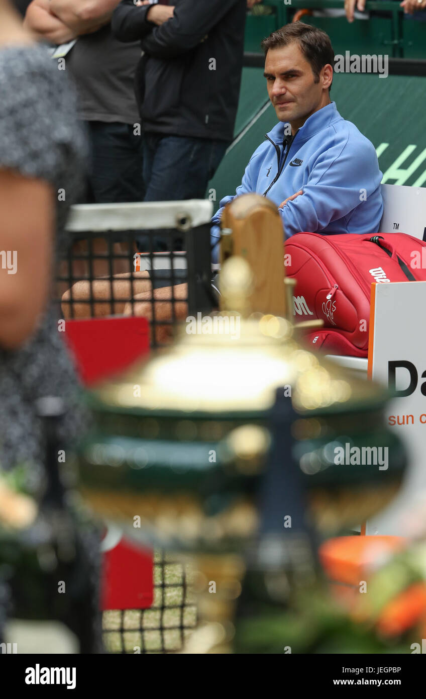 Halle, Germany. 25th June, 2017. Switzerland's Roger Federer sits on ...