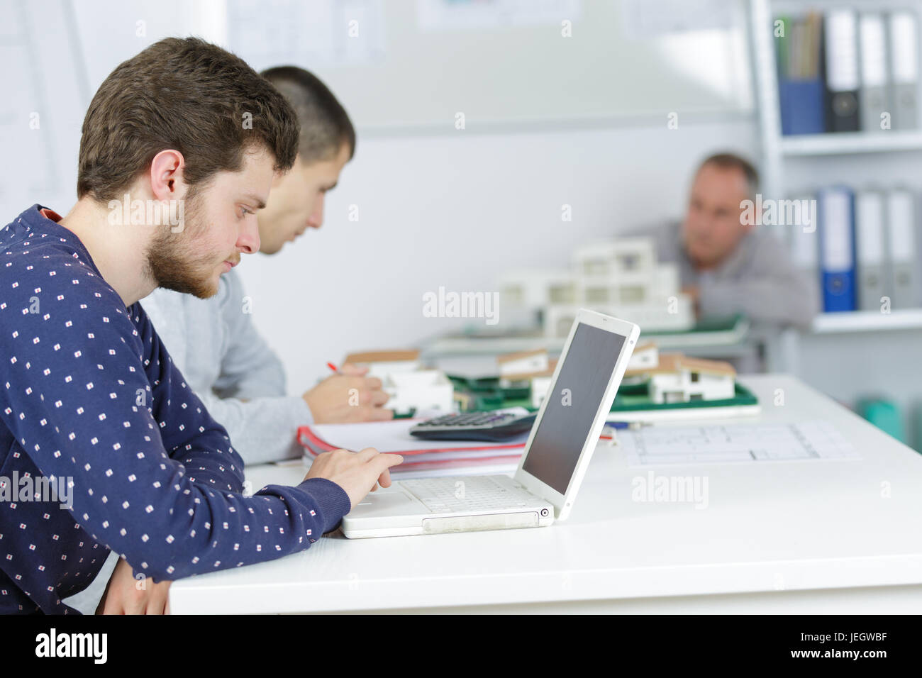 group of students working on construction project Stock Photo - Alamy