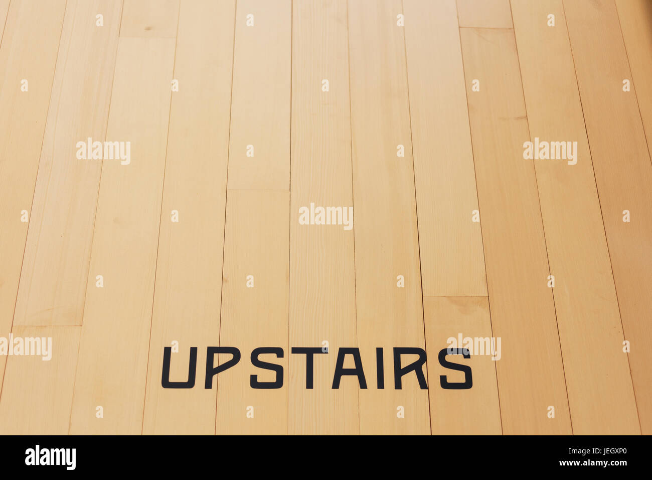 Upstairs signage on door Stock Photo - Alamy