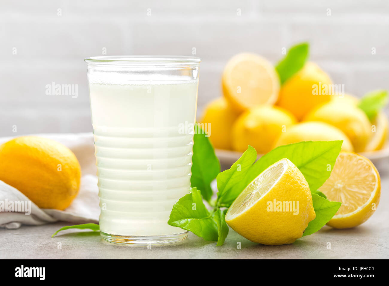 Lemonade drink with fresh lemons lemon cocktail with juice hi-res stock ...