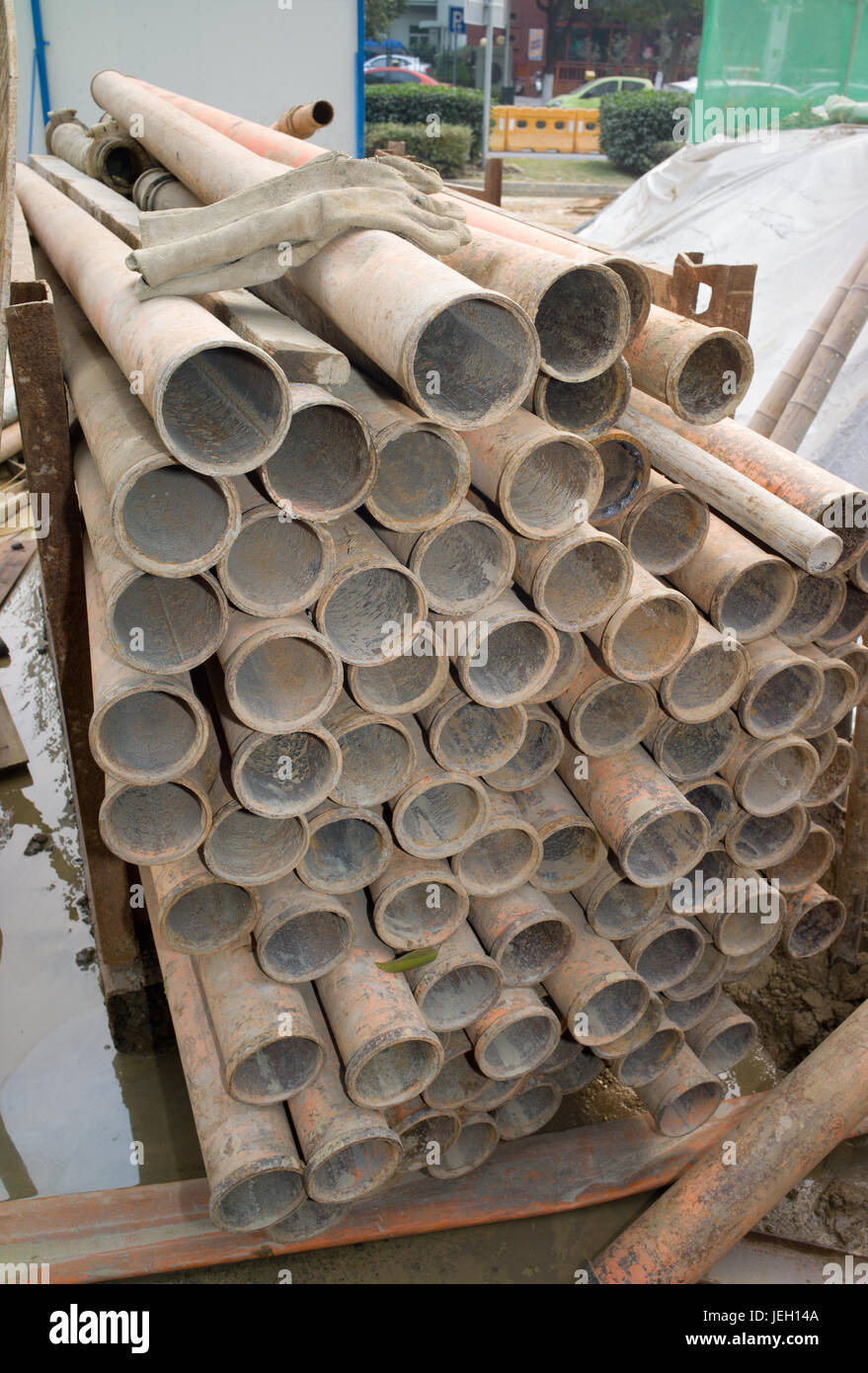 Stack of steel tubes at excavation site in Su Hui Road for access to ...