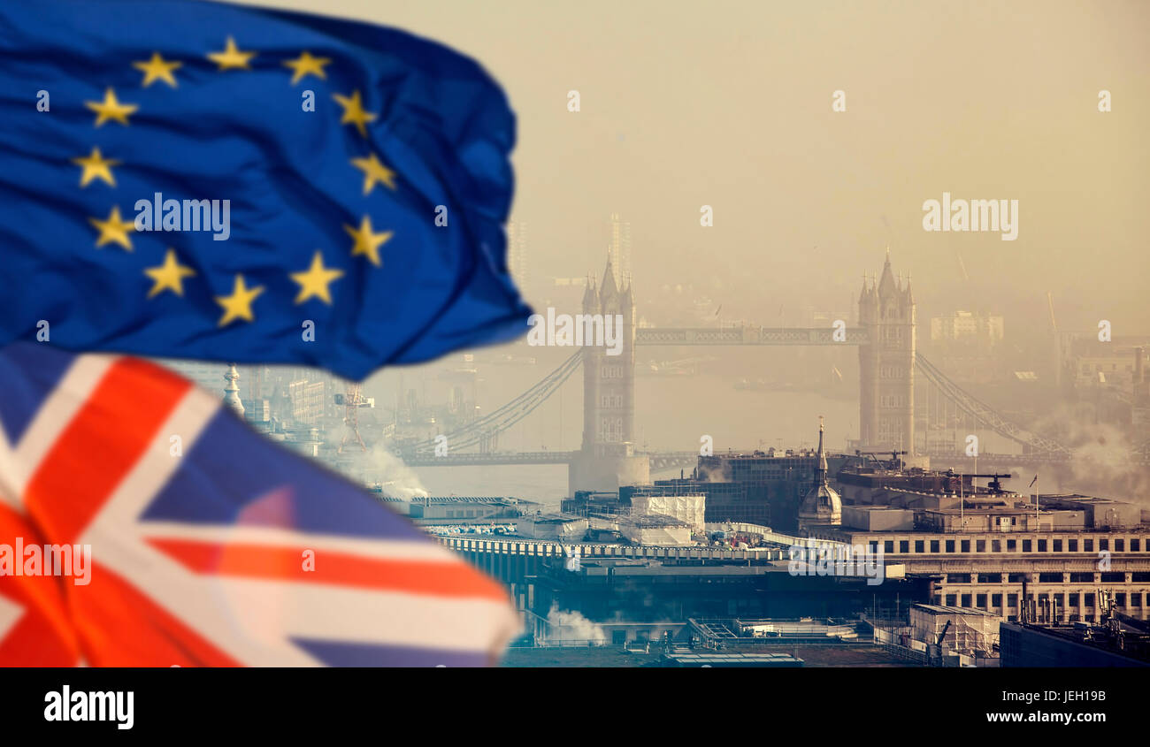 The European Union and the British Union flag over aerial view of ...
